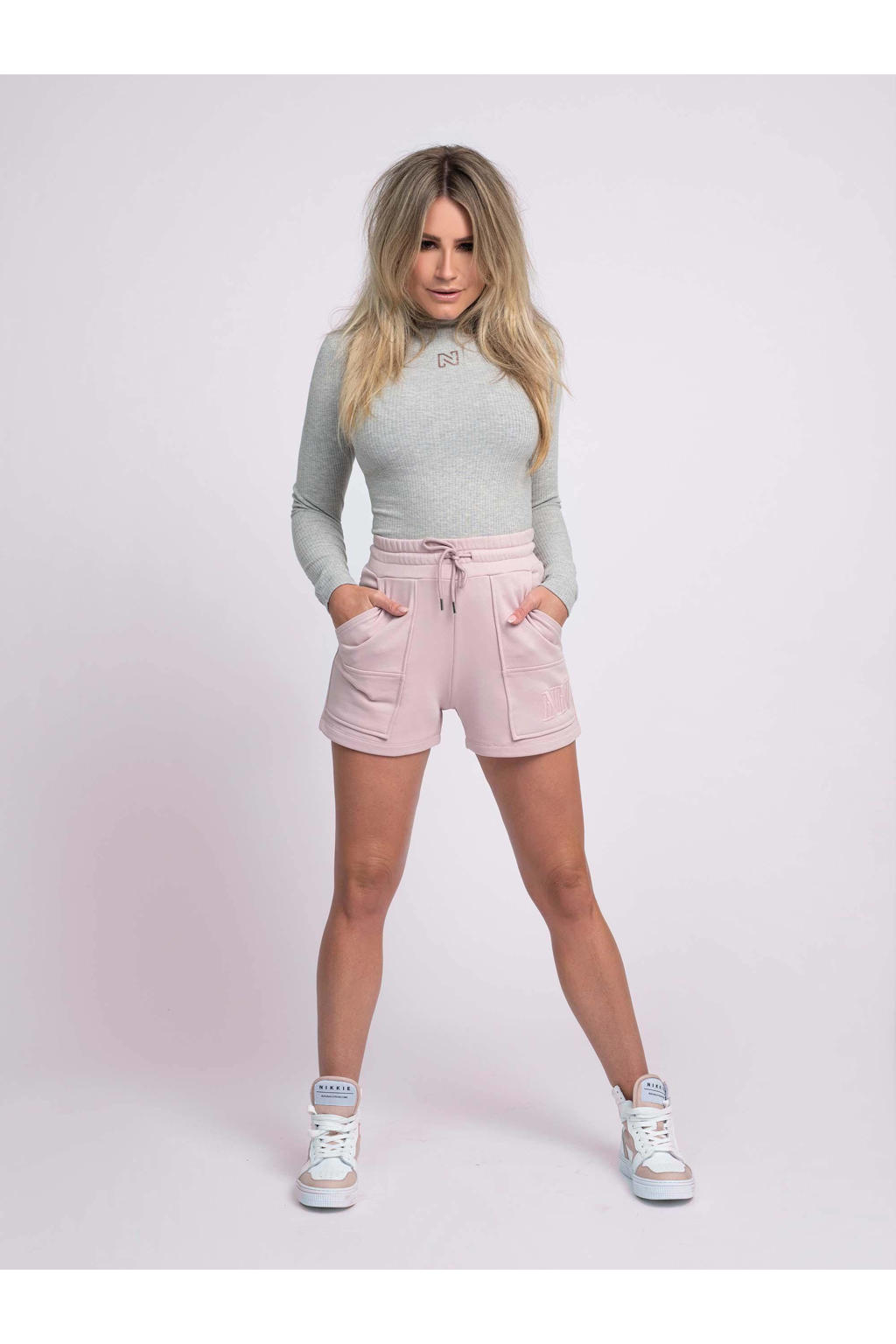 NIKKIE Livia hoge leren sneakers wit/roze | wehkamp